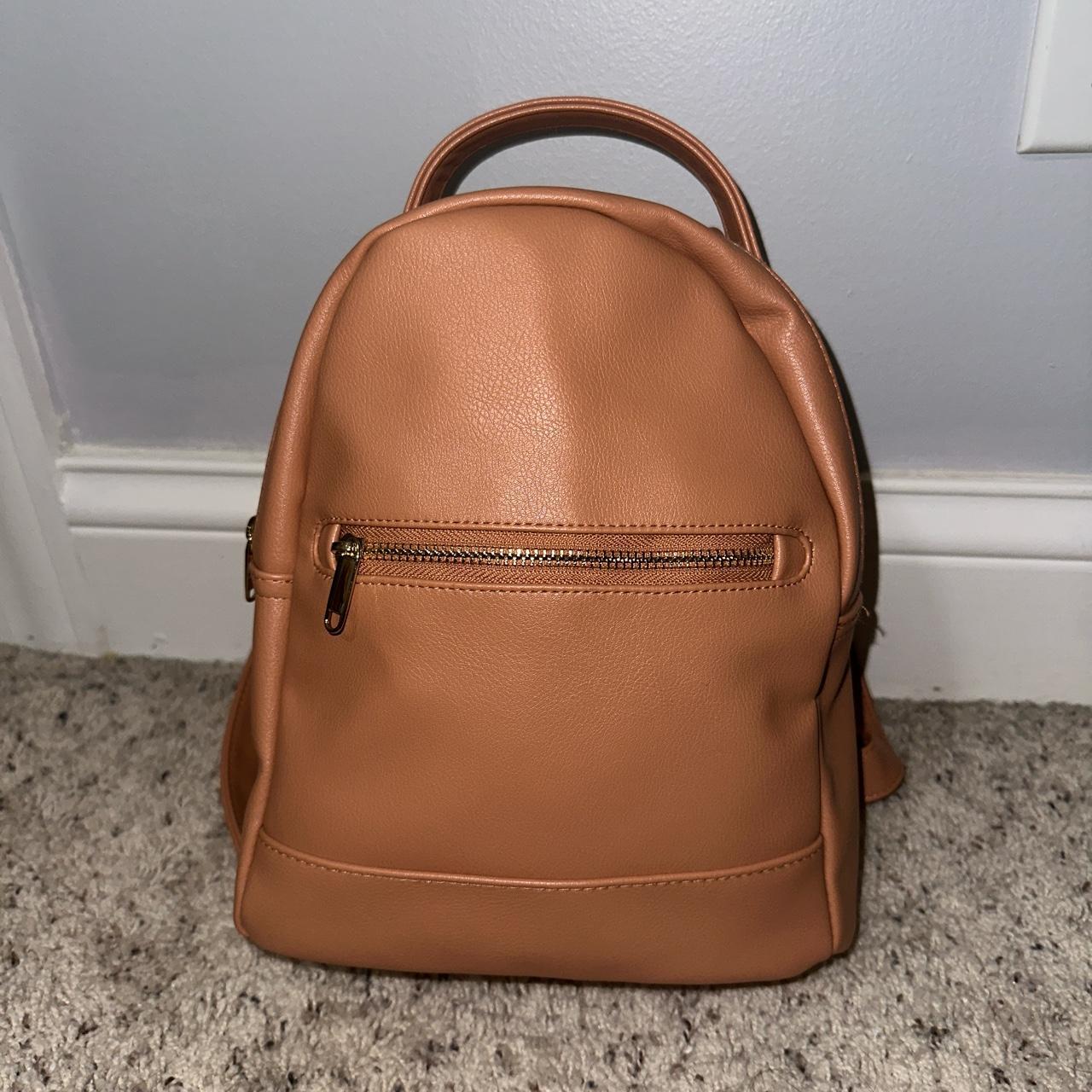 Tan mini backpack with adjustable straps. Front... - Depop