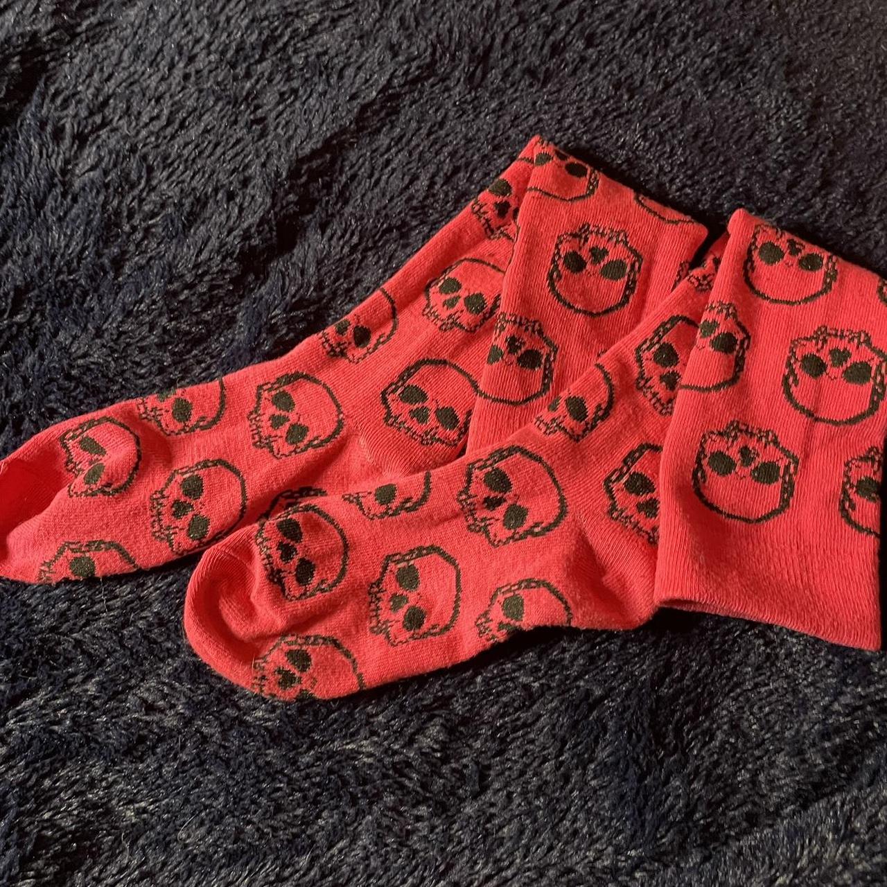 hot pink high skull socks. worn once to try... - Depop