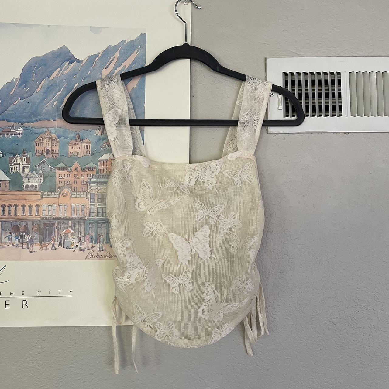 Really cute butterfly cream colored top from cider!... - Depop