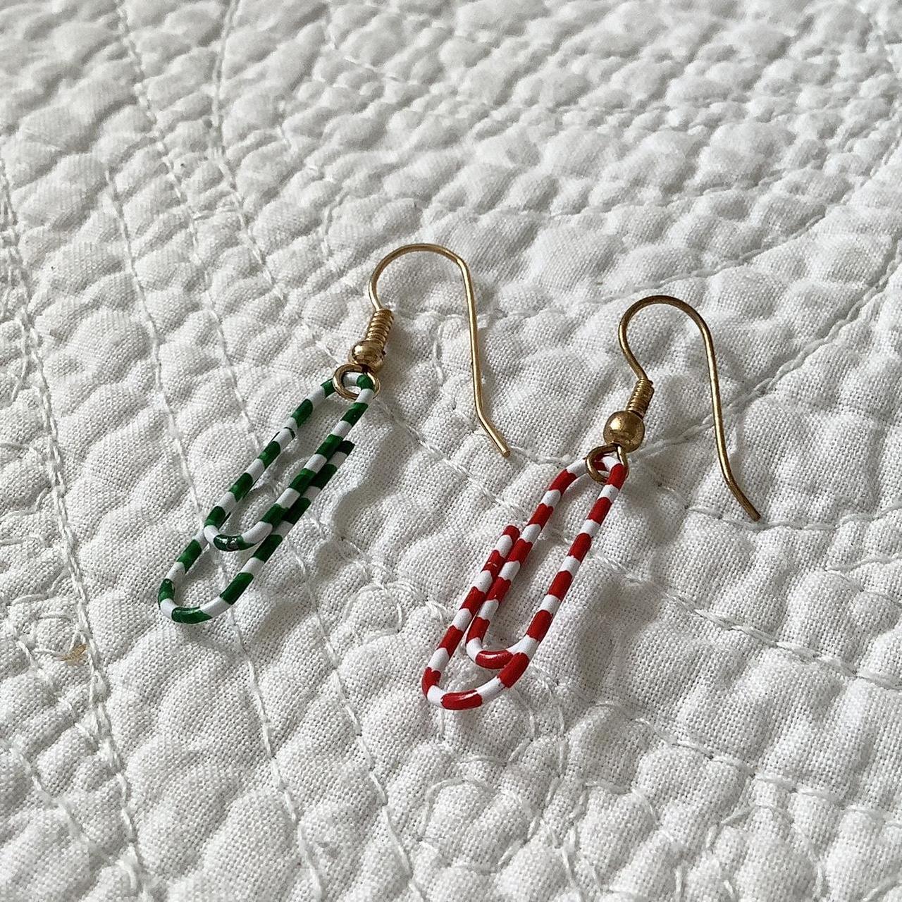 Red, green and white paper clip hook... - Depop