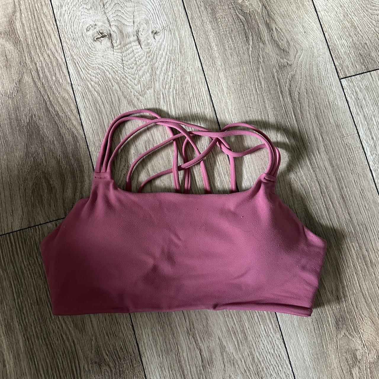 Pink Athleta sports bra. Pre loved but still overall... | Depop
