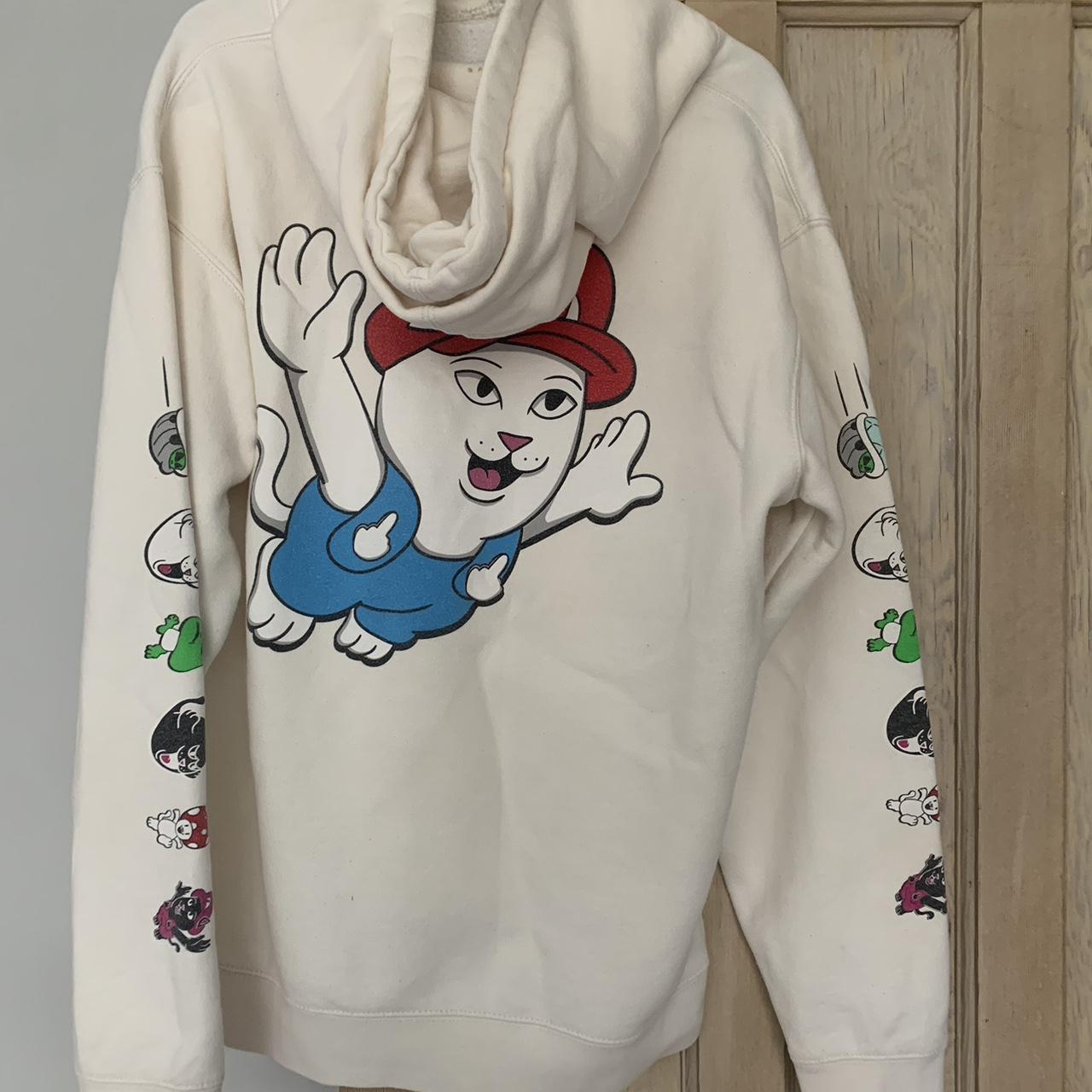 RIPNDIP cat mario hoodie, light cream Size:... - Depop