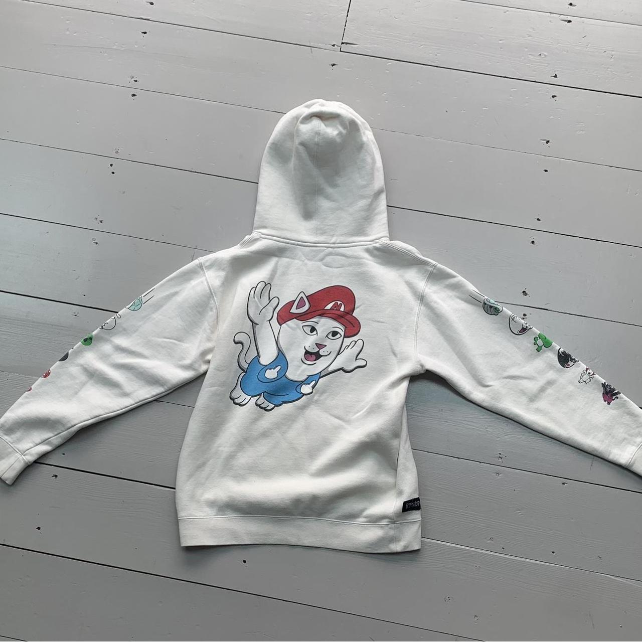 RIPNDIP cat mario hoodie, light cream Size:... - Depop