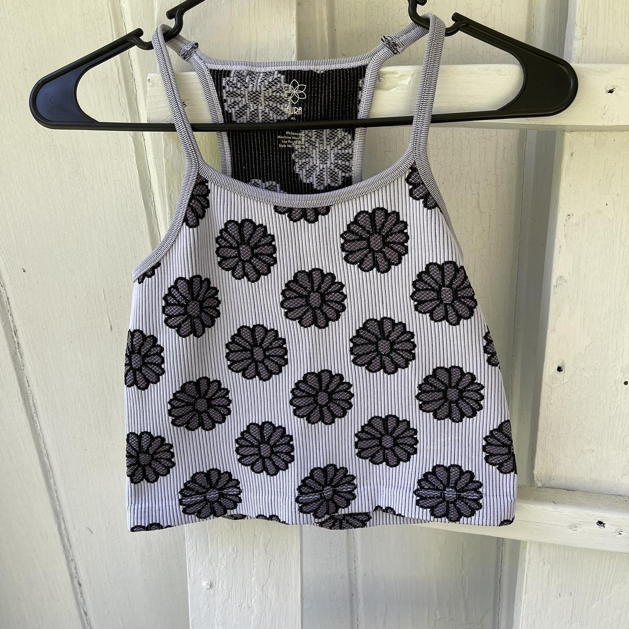 Here a cute little cropped tank top With flower... - Depop