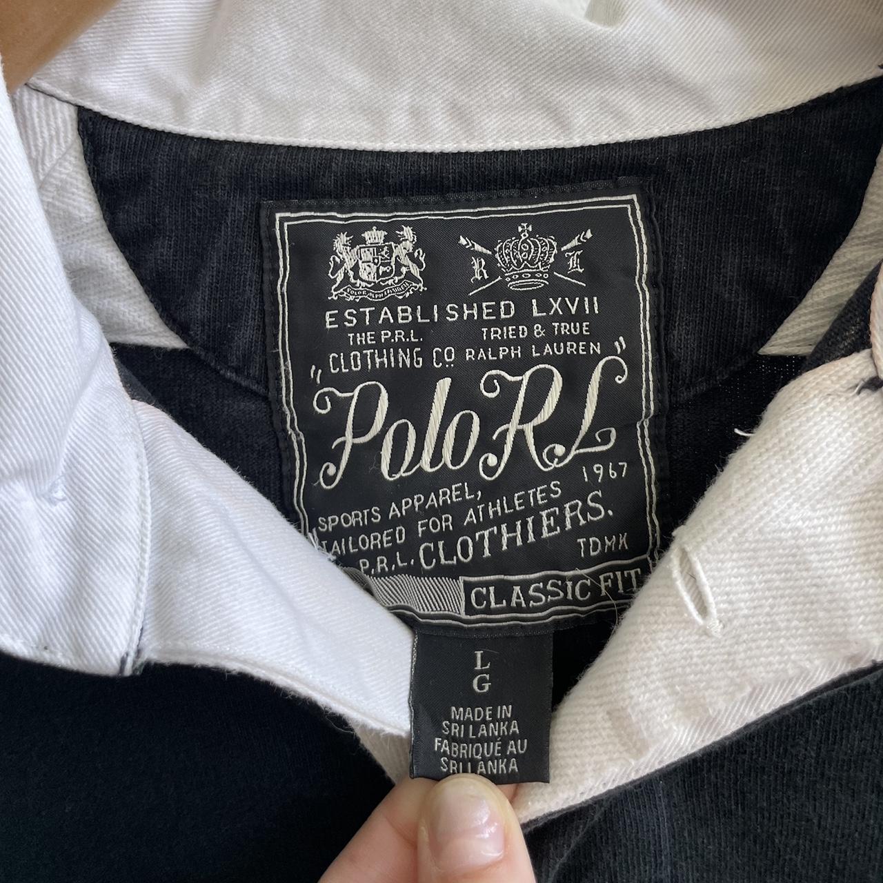 black polo top with skull and bones design. men’s... - Depop