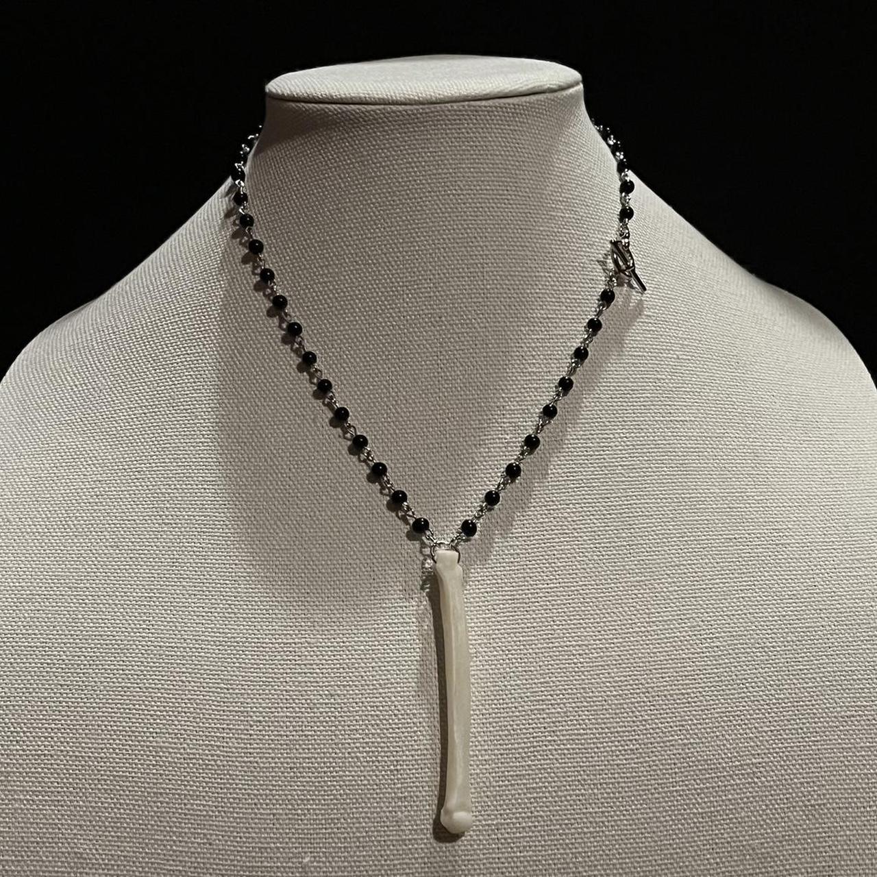 Coyote Toe Bone Necklace beads are glass, has... - Depop