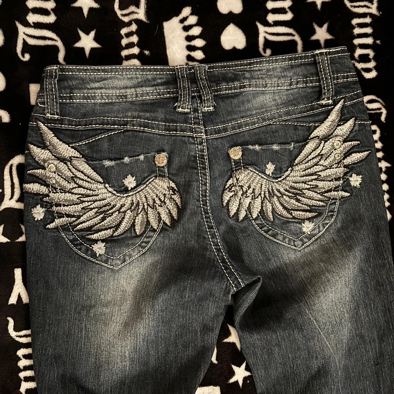 Low rise jeans with embroidered angel wings and... - Depop