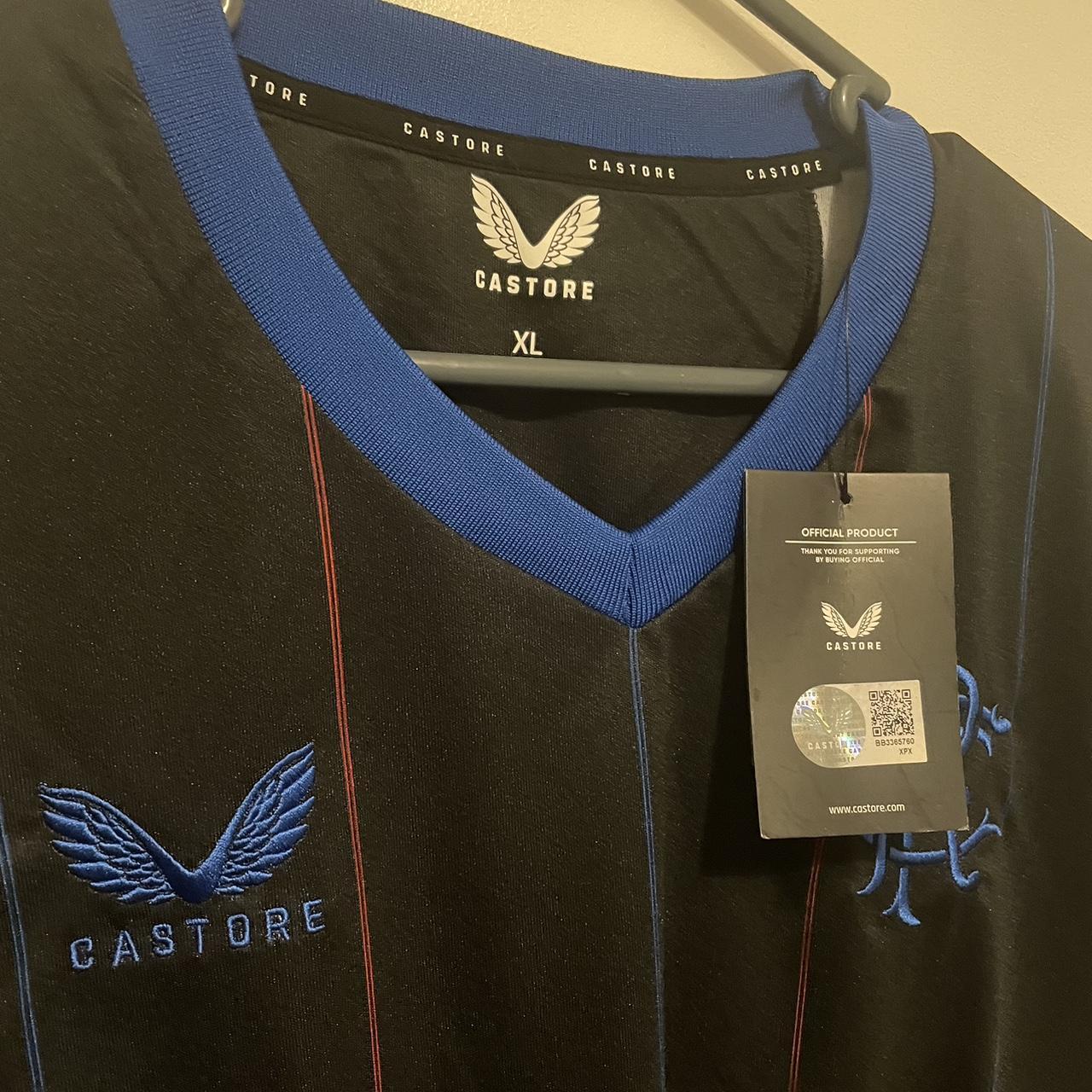 Castore Men's Black and Blue T-shirt | Depop