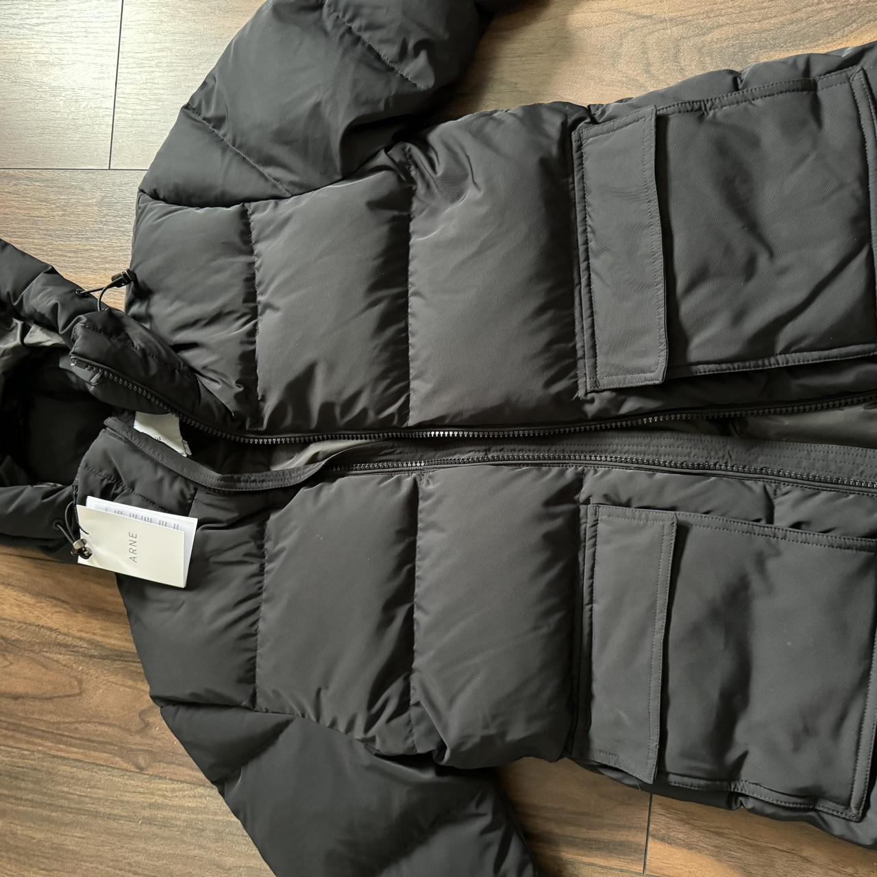 Black Arne puffer jacket still with tags on selling... - Depop
