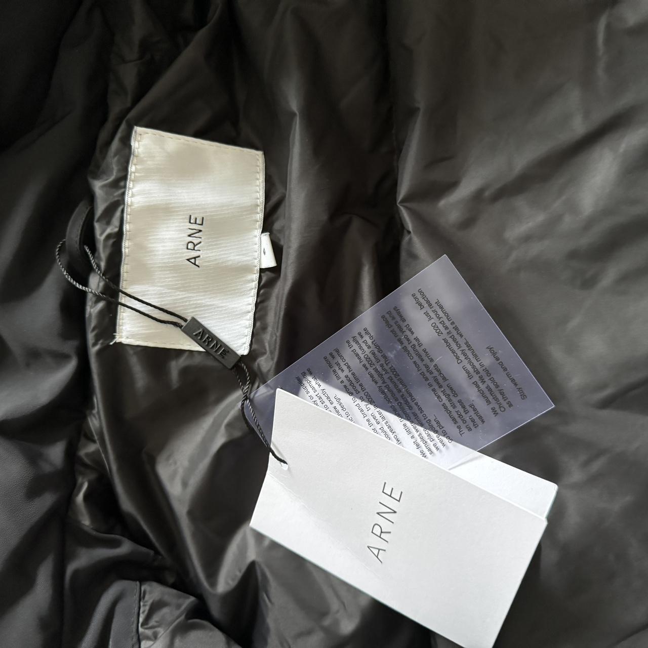 Black Arne puffer jacket still with tags on selling... - Depop