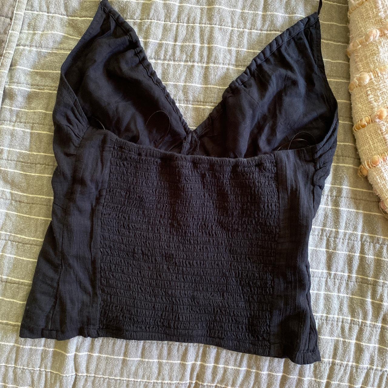 Black halter top! Front cinches with strap... - Depop
