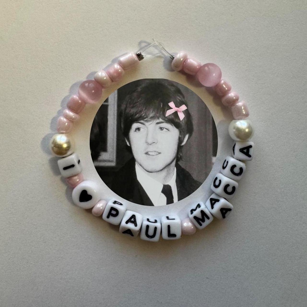 I ️ Paul Macca bracelet!! Made with .5 mm elastic... | Depop