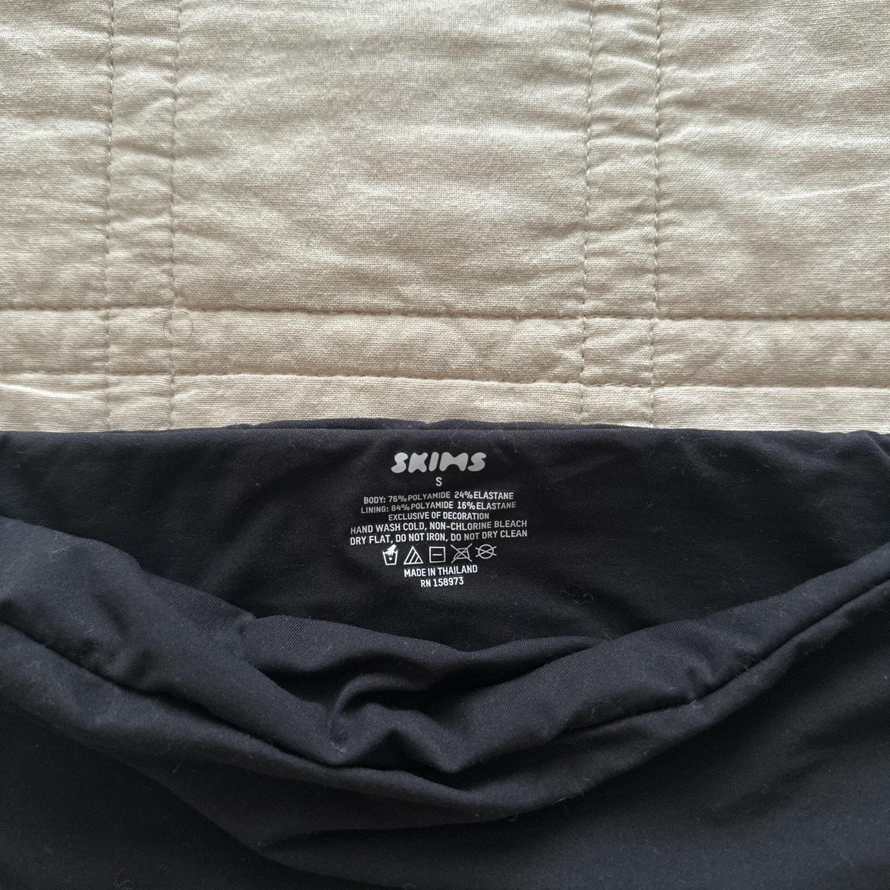 Skims black bandeau top/bra Size small Brand new... - Depop