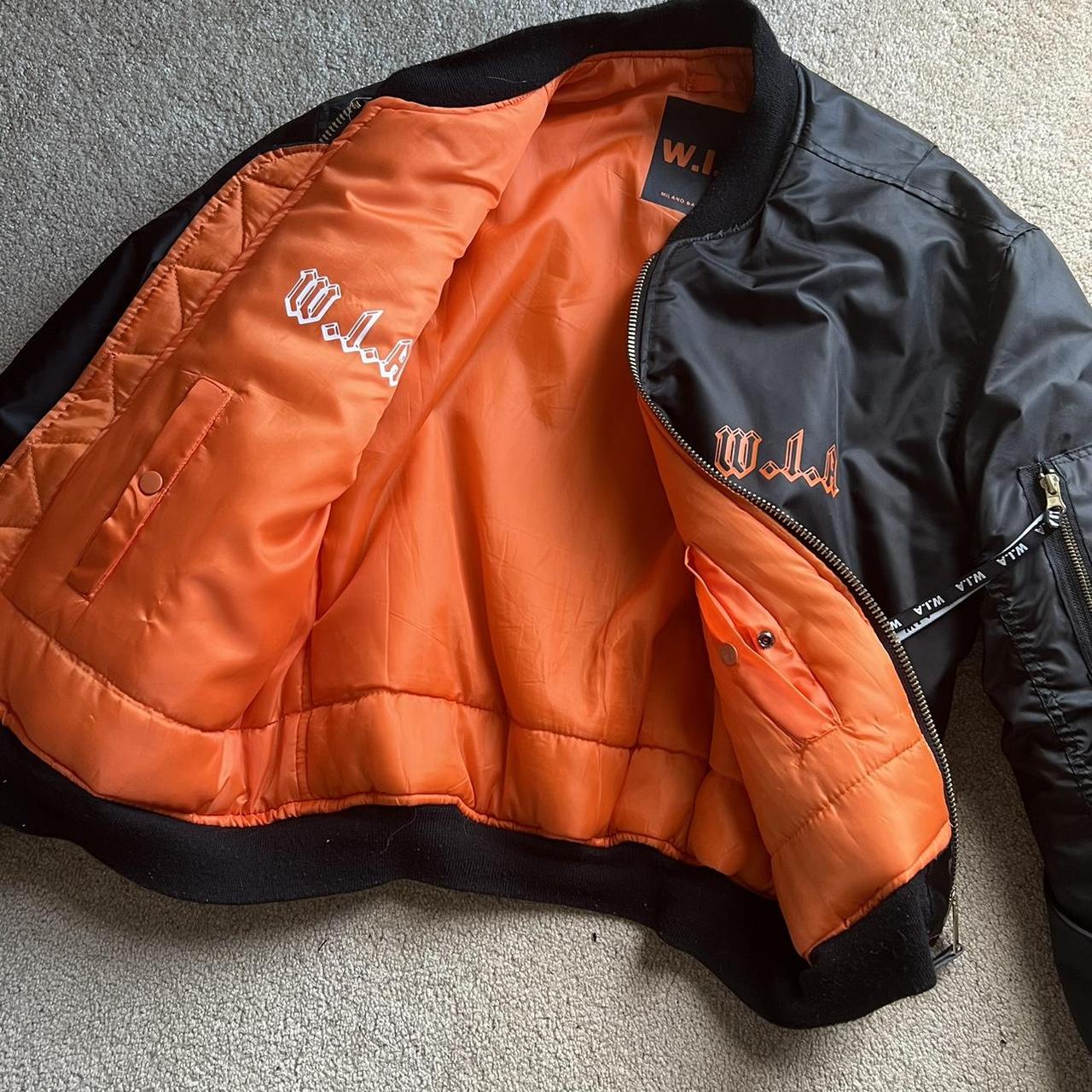 W.I.A Men's Black and Orange Jacket | Depop