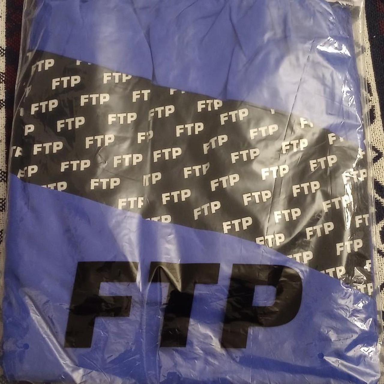 FTP all over print track pants. Blue with all over... | Depop