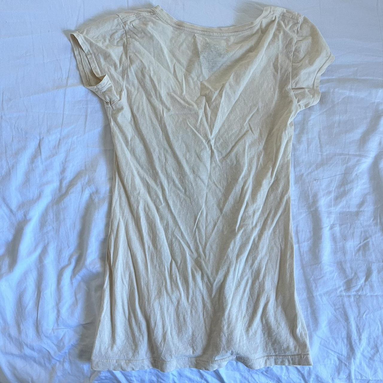 Stranded yellow and cream graphic design top Size:... - Depop