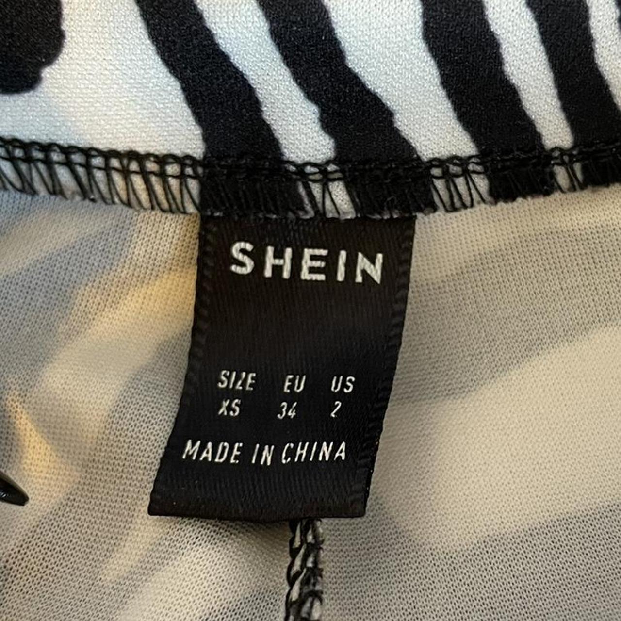 SHIEN zebra print flared leggings size xs - Depop