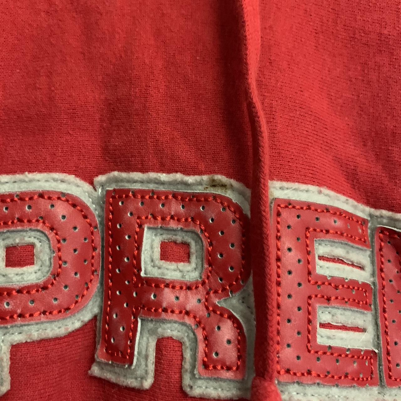 Red supreme hoodie. Good quality. Small blemish in... - Depop