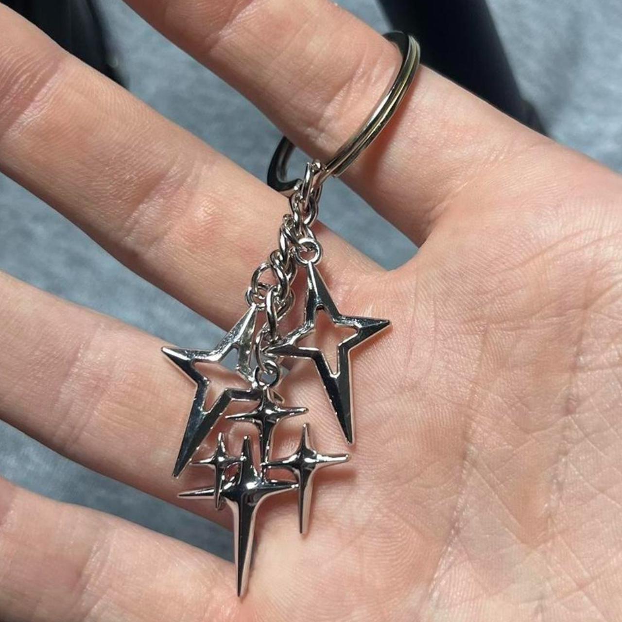 cyber y2k / 2000s star keychain this keychain is... - Depop