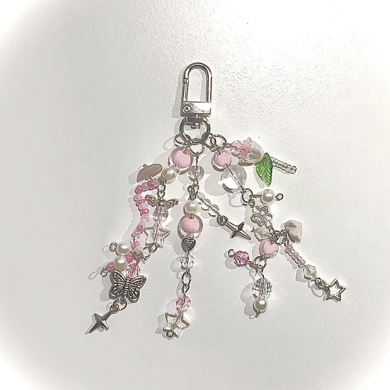 Pink coquette keychain... - Depop