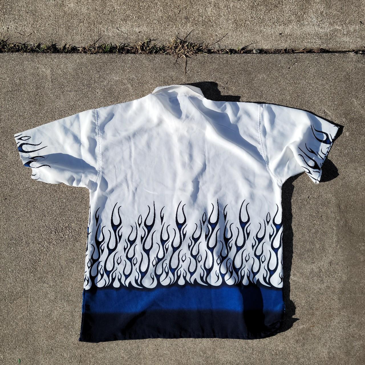 Dope y2k blue flame button up. Has one small tear on... - Depop