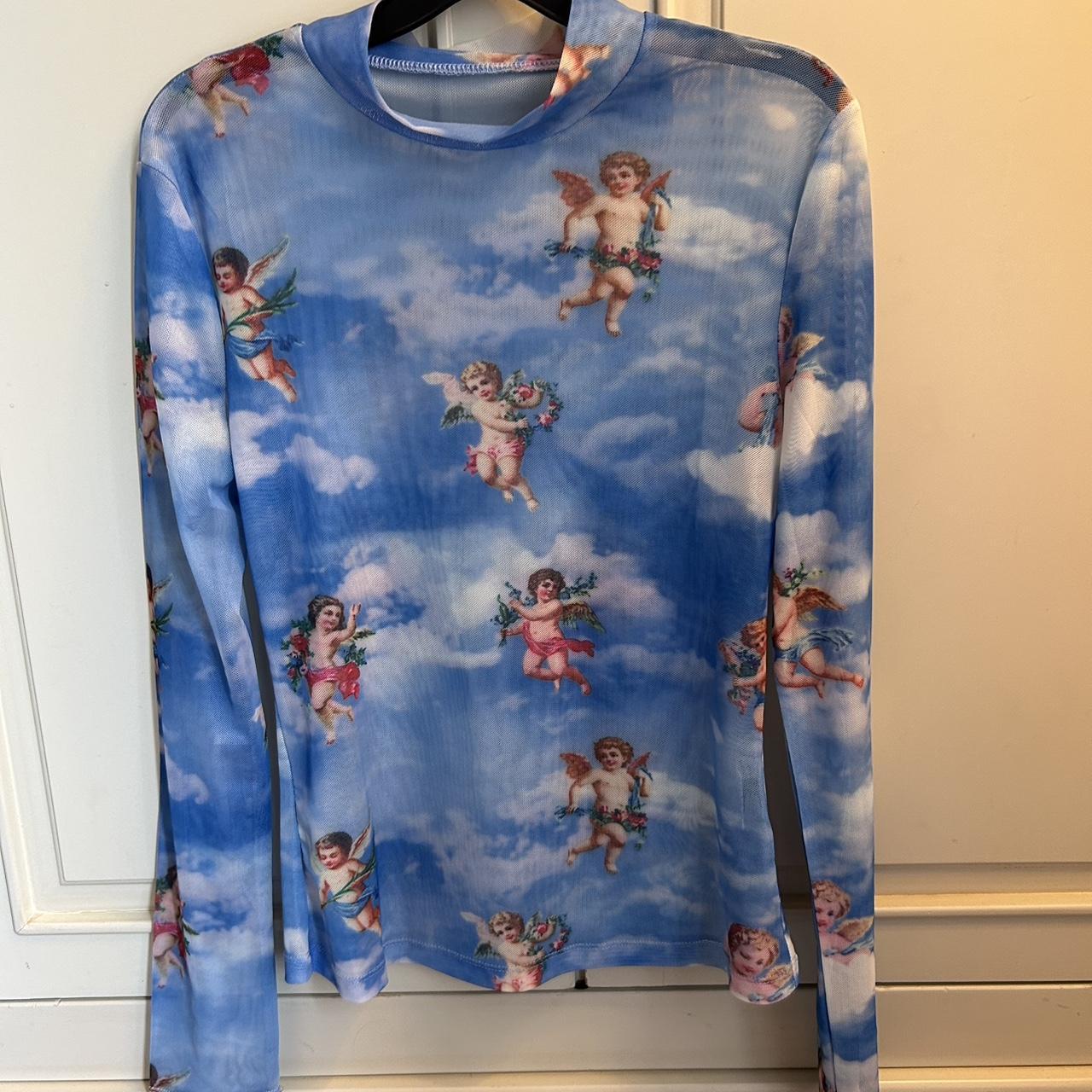 Blue mesh angel print top Long sleeve Size... - Depop