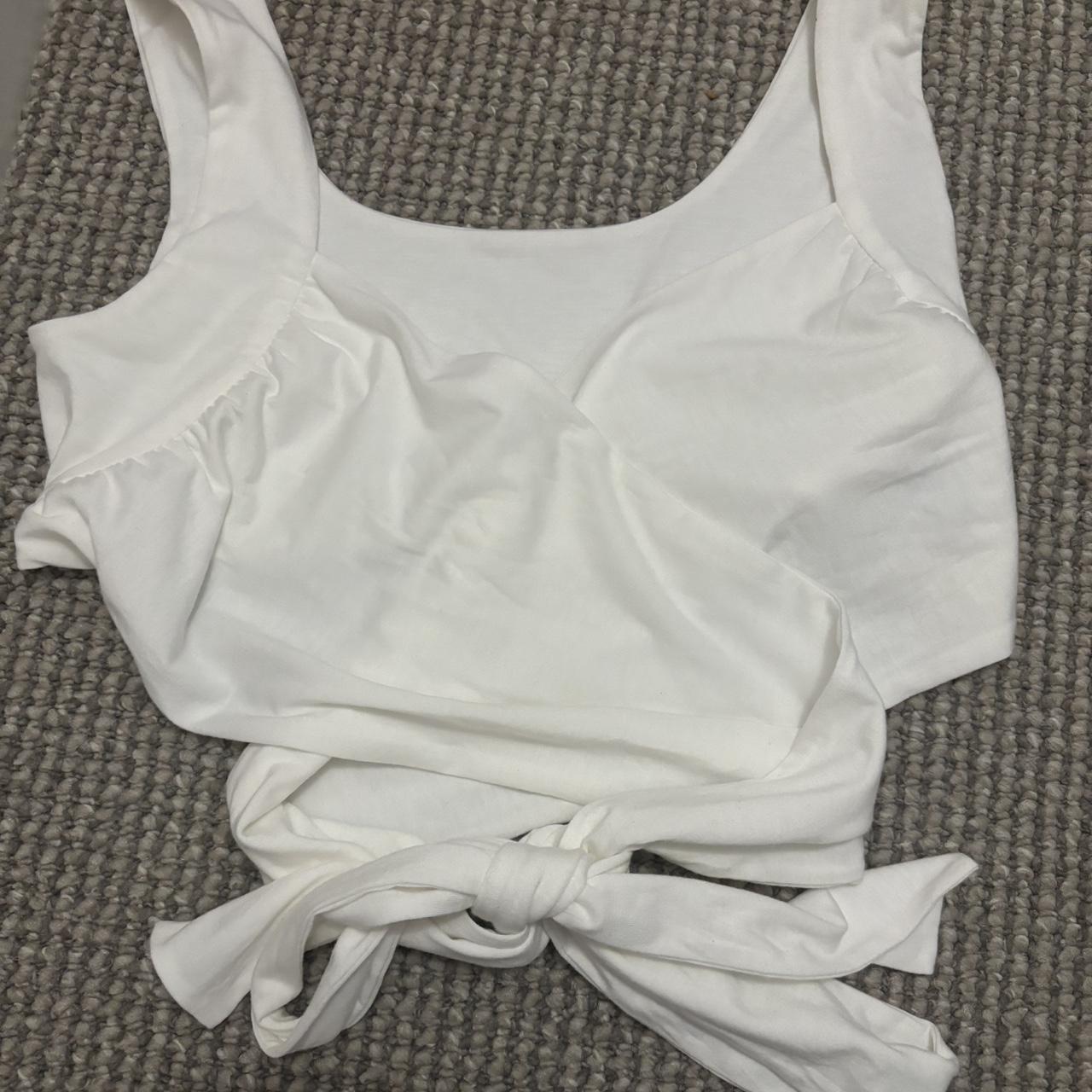 White adjustable crop, ties around body. Never worn. - Depop