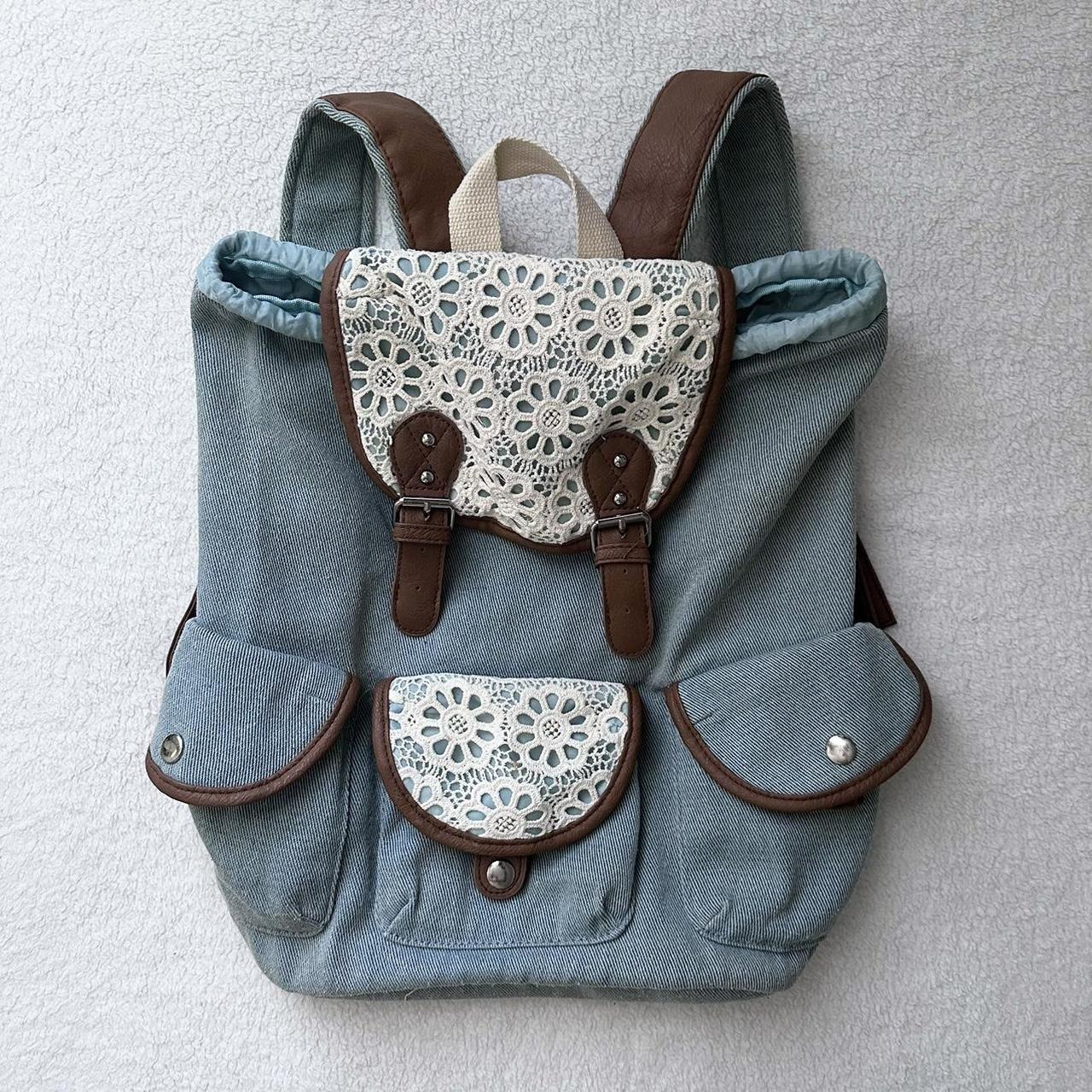 Blue/brown backpack with lace | Used - in good... - Depop