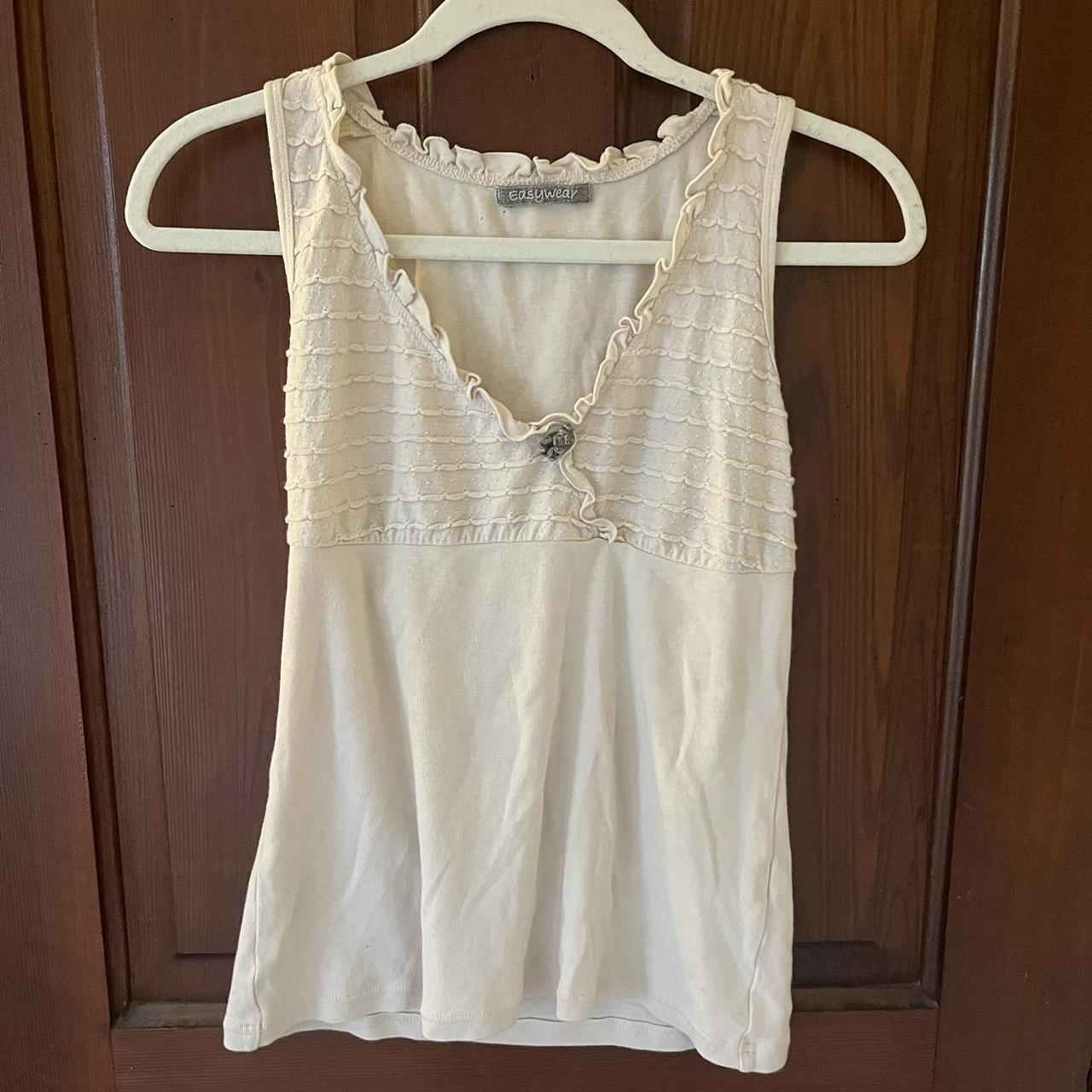 cream tank super cute tank with little rose... - Depop