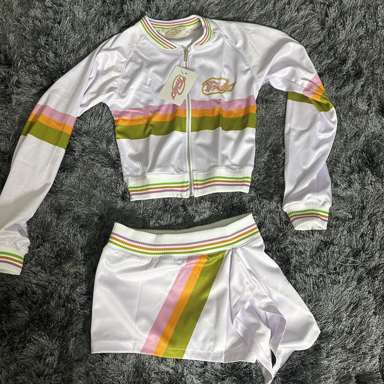 A stylish 2-piece skirt tracksuit set with a chic... - Depop