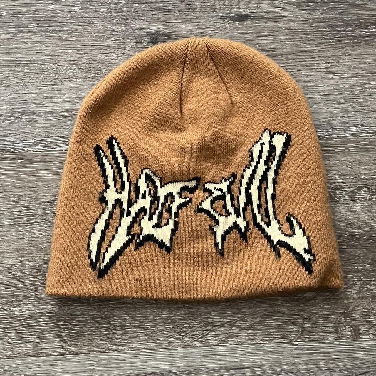 Half evil skully beanie rarely worn - Depop