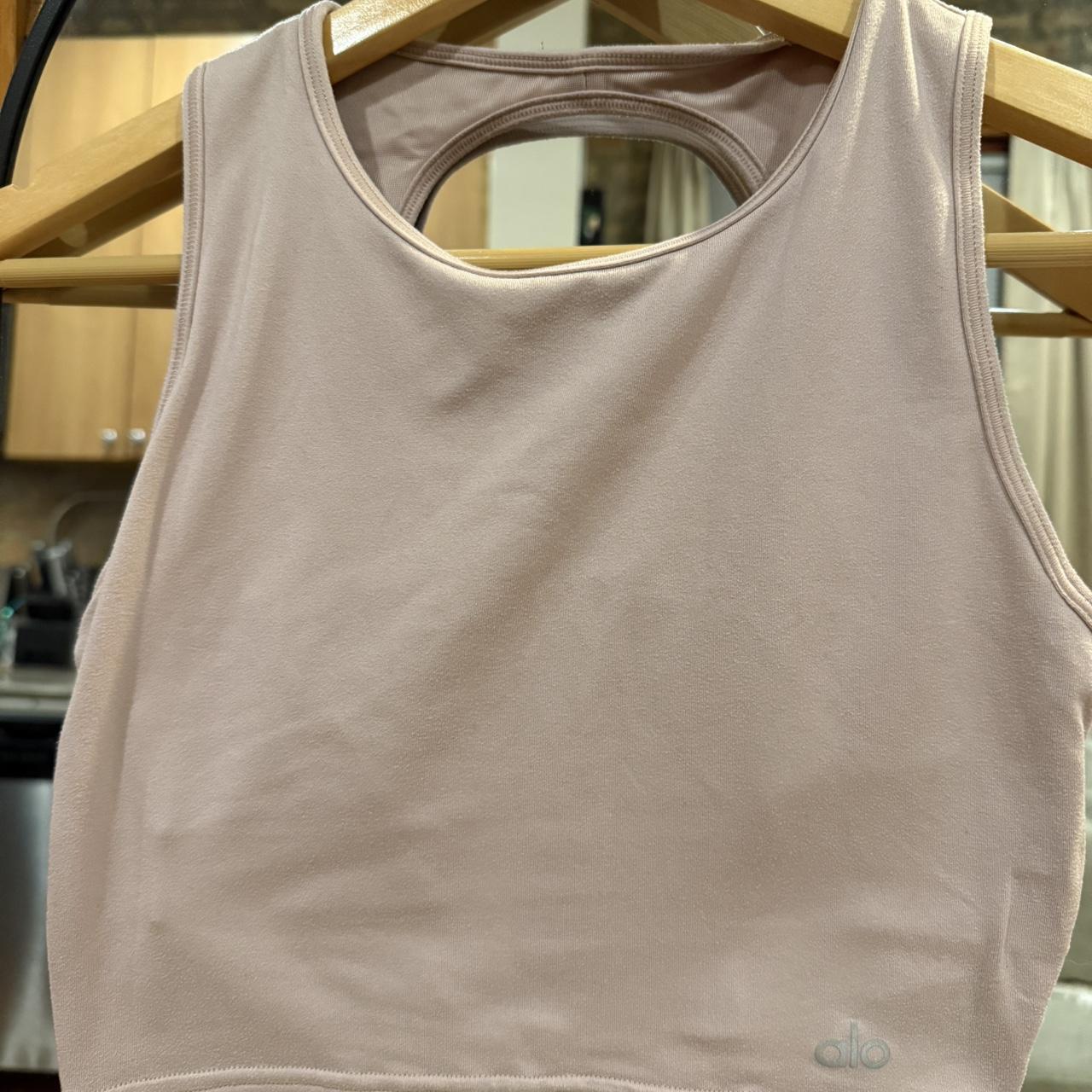 Light pink Alo tank top with cut out back detail... | Depop