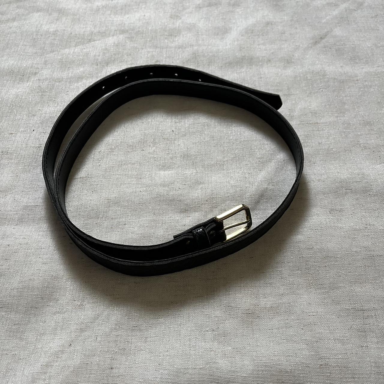 Black minimalist pencil belt with gold buckle.... - Depop