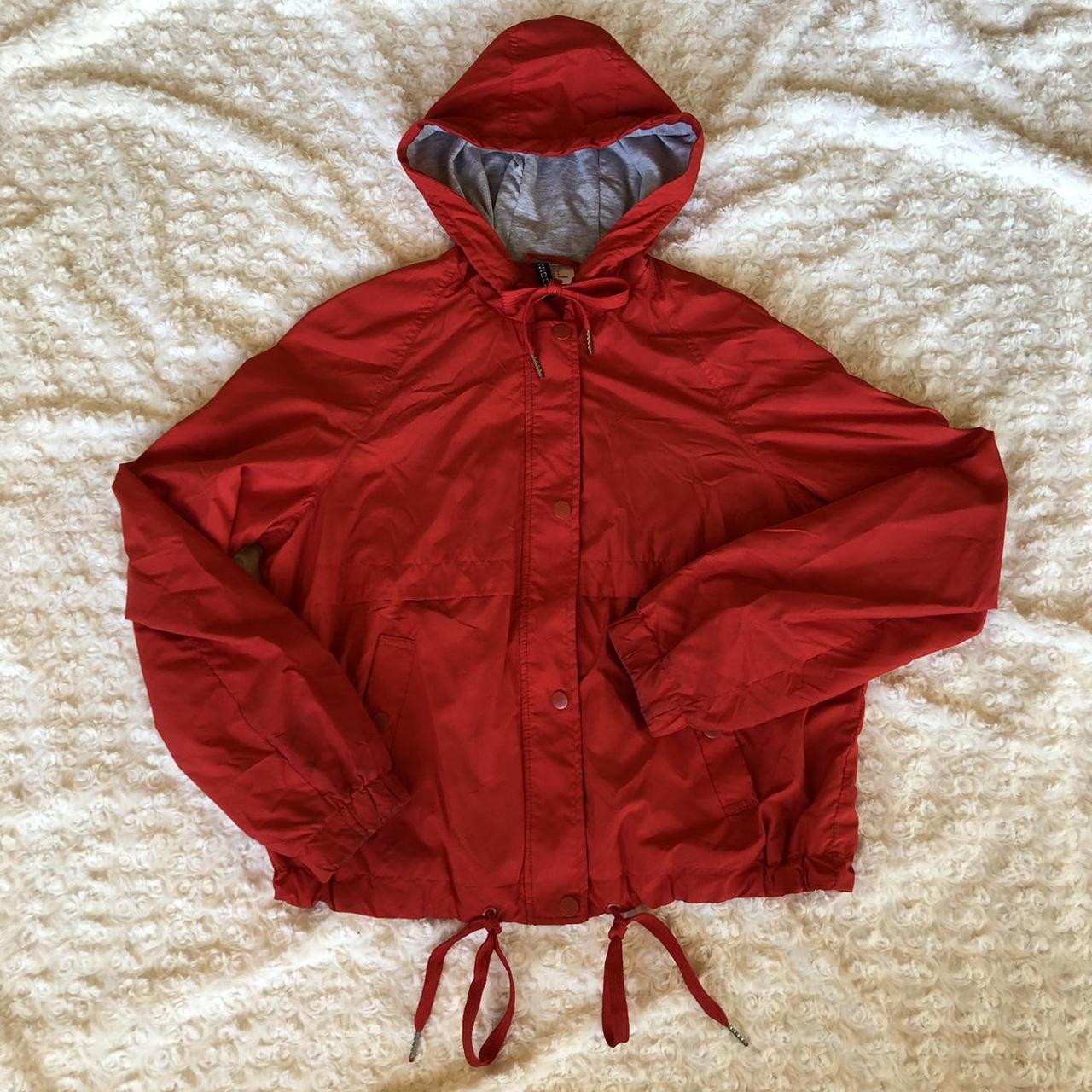 Red zipper/snap up rain jacket! With gray cotten... - Depop