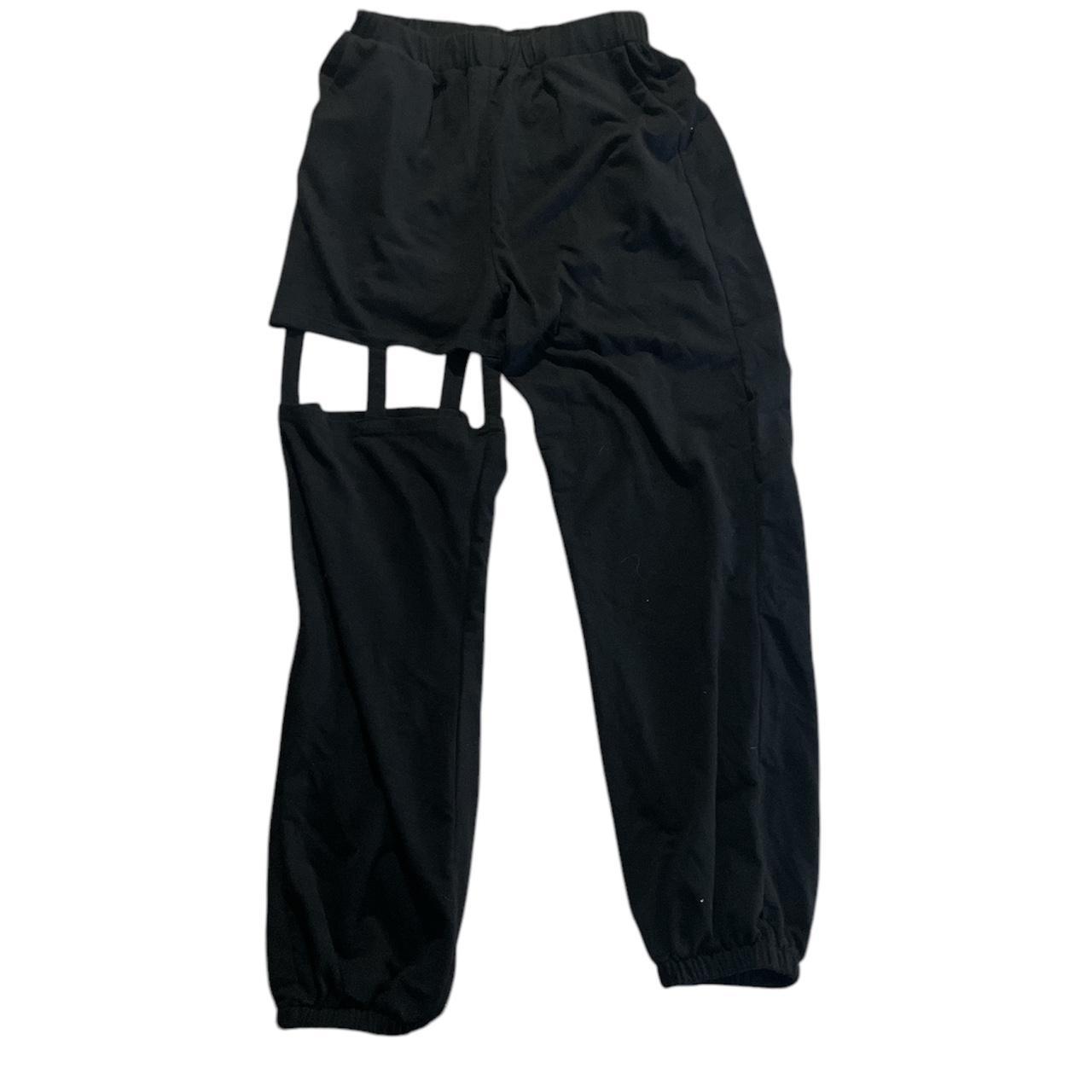 funky black cut out sweatpants w pockets by romwe.... - Depop