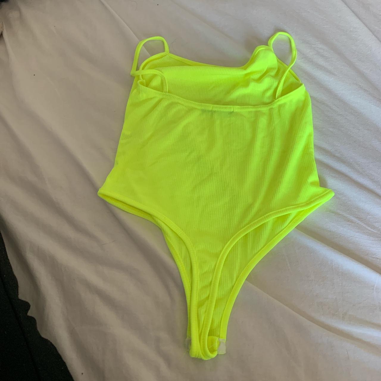 Luminous yellow bodysuit. Straight neck fit. - Depop