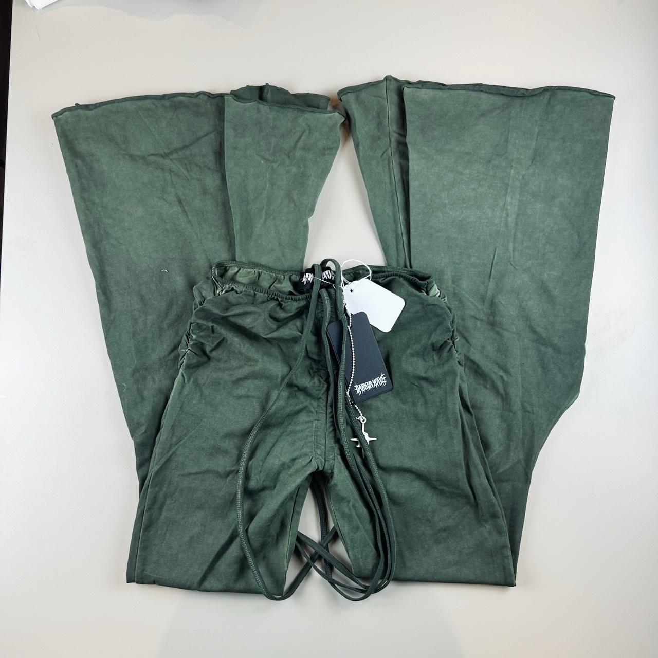 Darker Wavs reverb v-cut green washed flared... - Depop