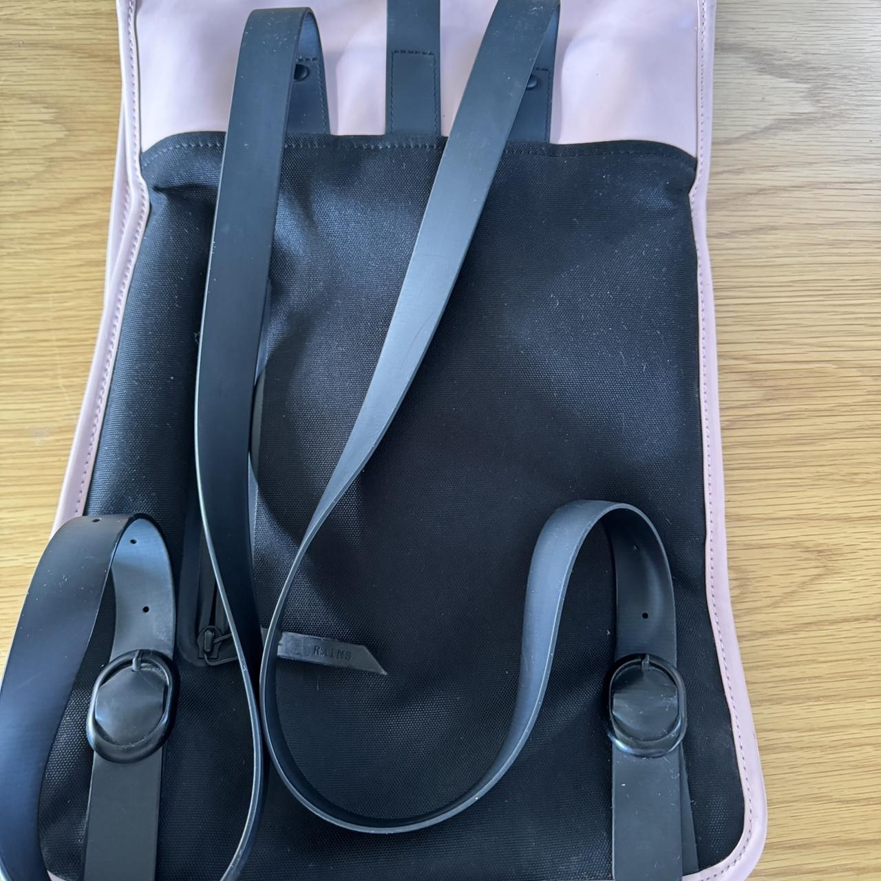 Pink rains backpack, used but in great condition - Depop