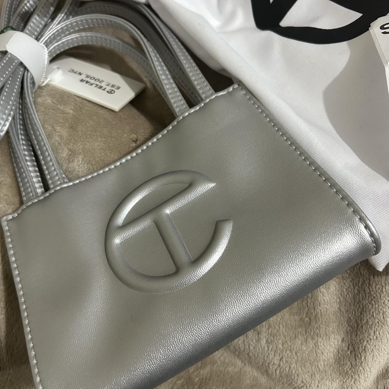 Small silver telfar bag , never worn , 100%... - Depop