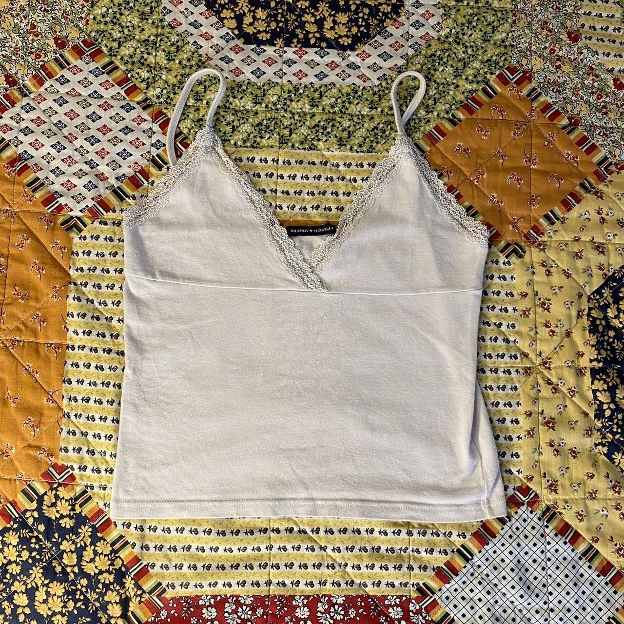 Brandy Melville white/pink lace tank Has a pink... - Depop