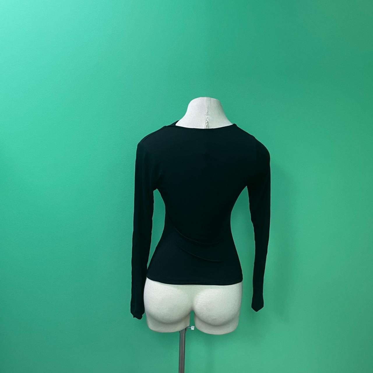 Upgrade your closet today with the Krisa Cutout Top!... - Depop