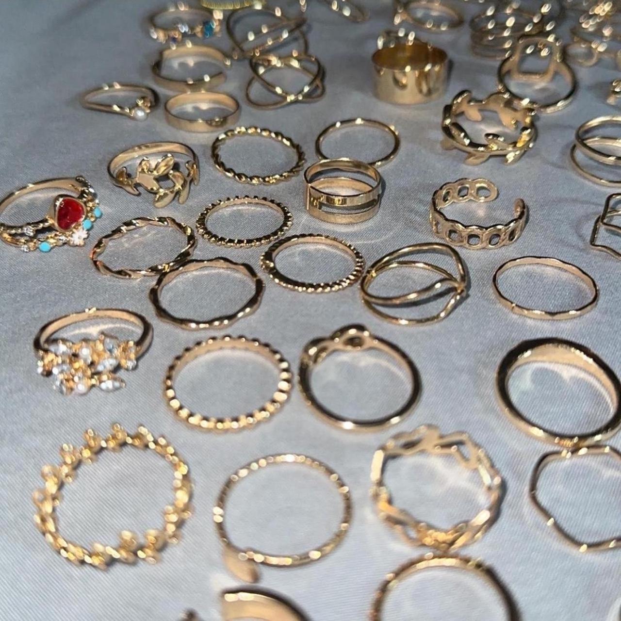 10 random rings that include the red stone... - Depop