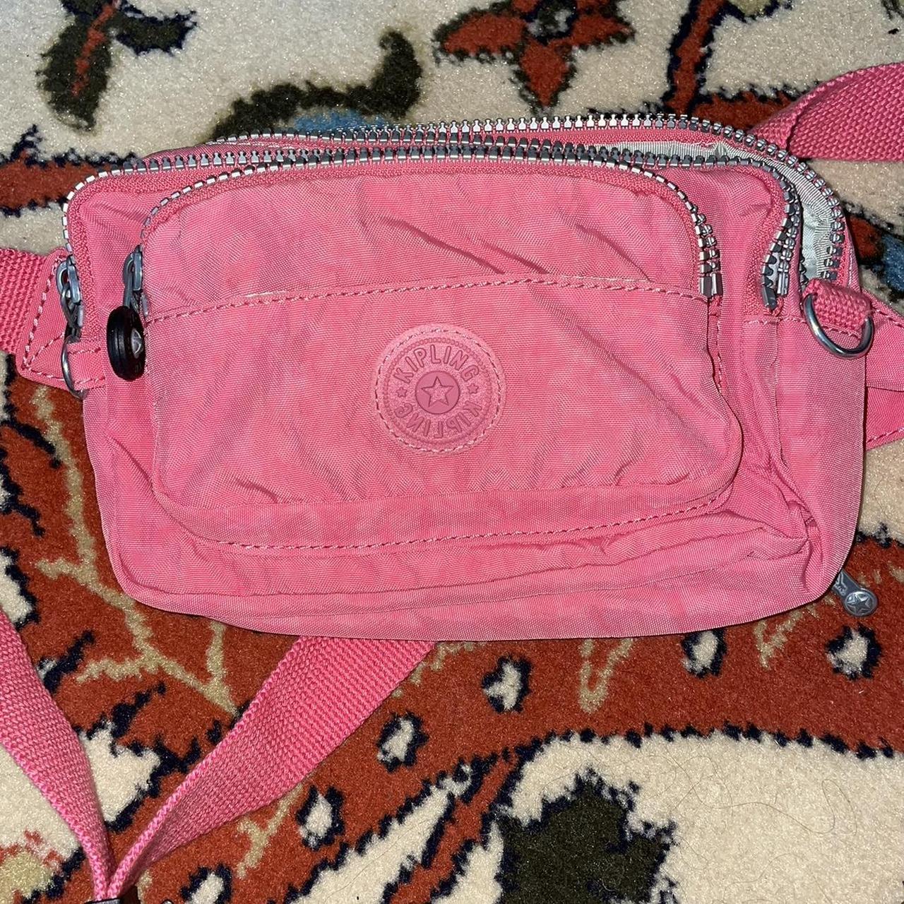 Pink Kipling Fanny pack, great condition has lots of... - Depop