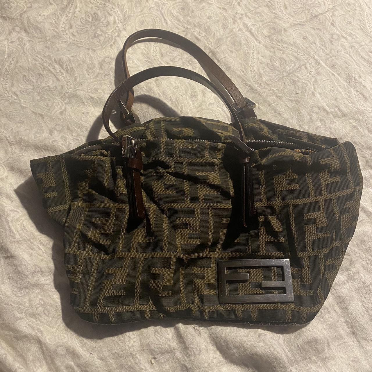 Fendi hand bag. In used condition but lots of life... - Depop