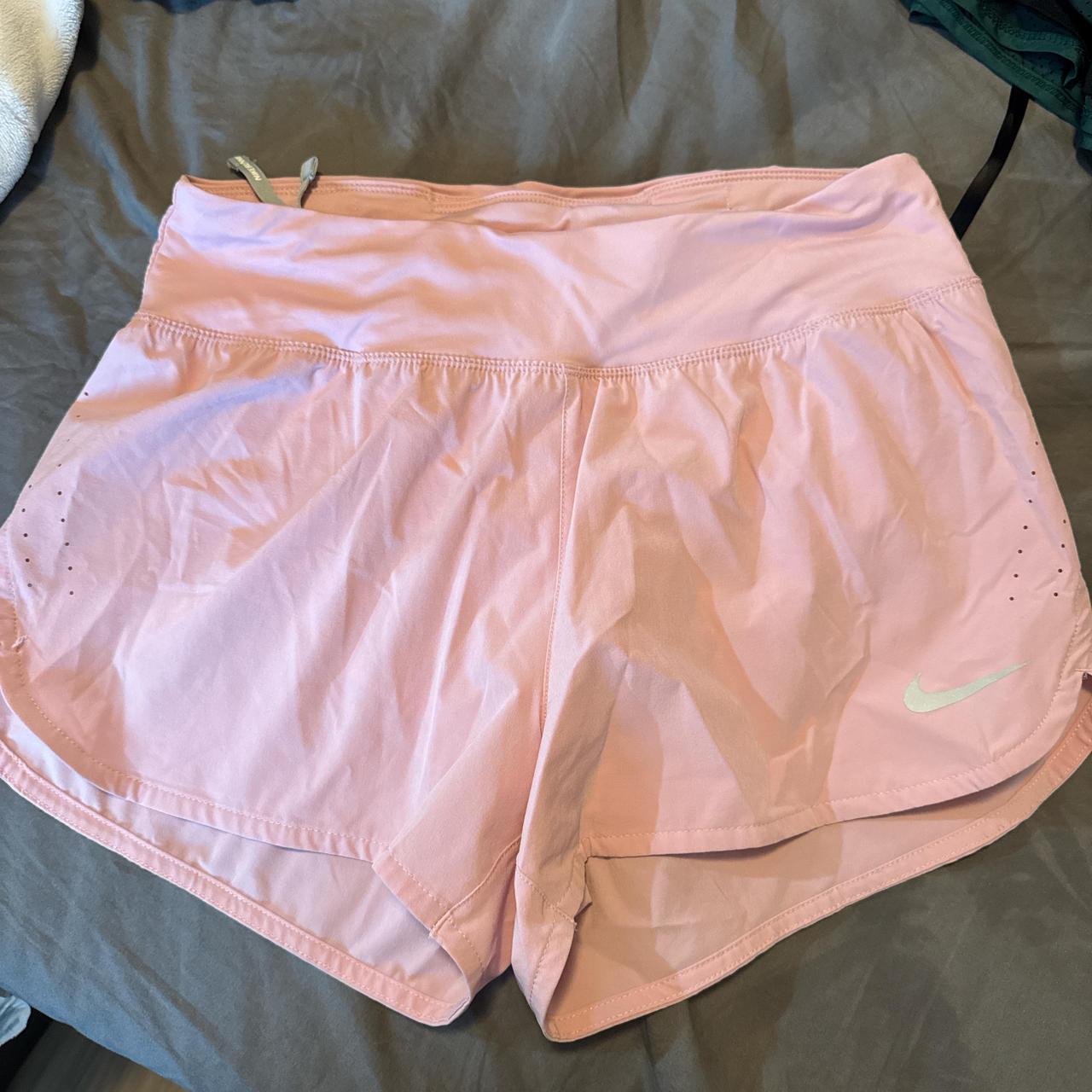 Light pink Nike running short La size Medium like... | Depop