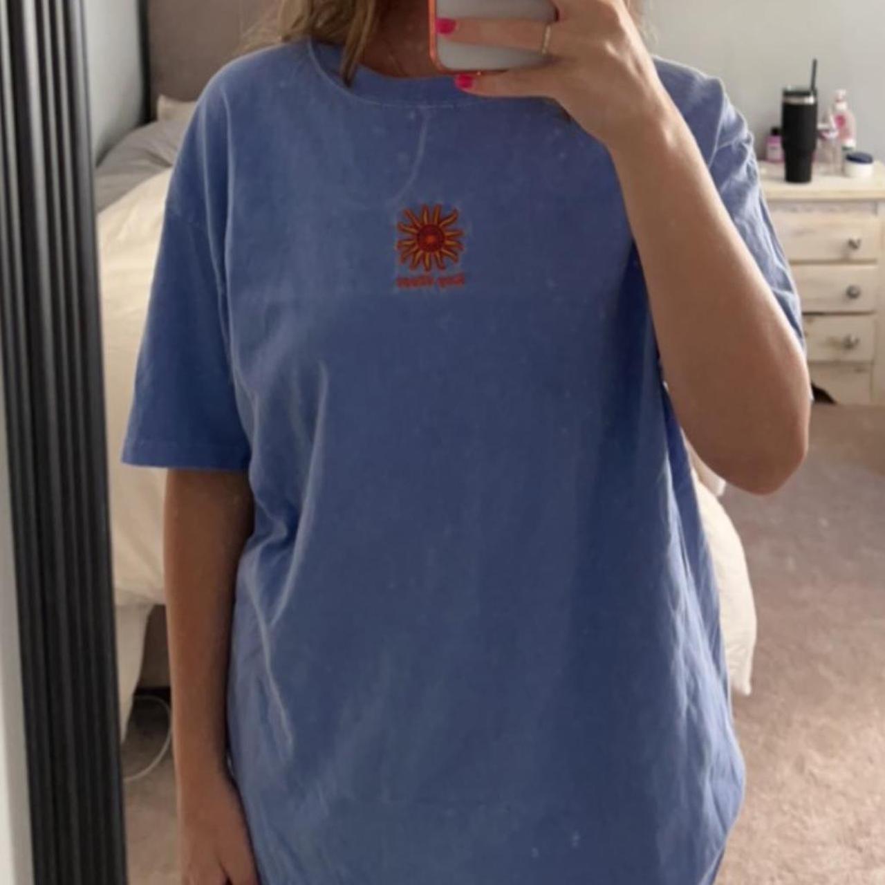 Key west blue tee shirt, super cute has a sun logo... - Depop