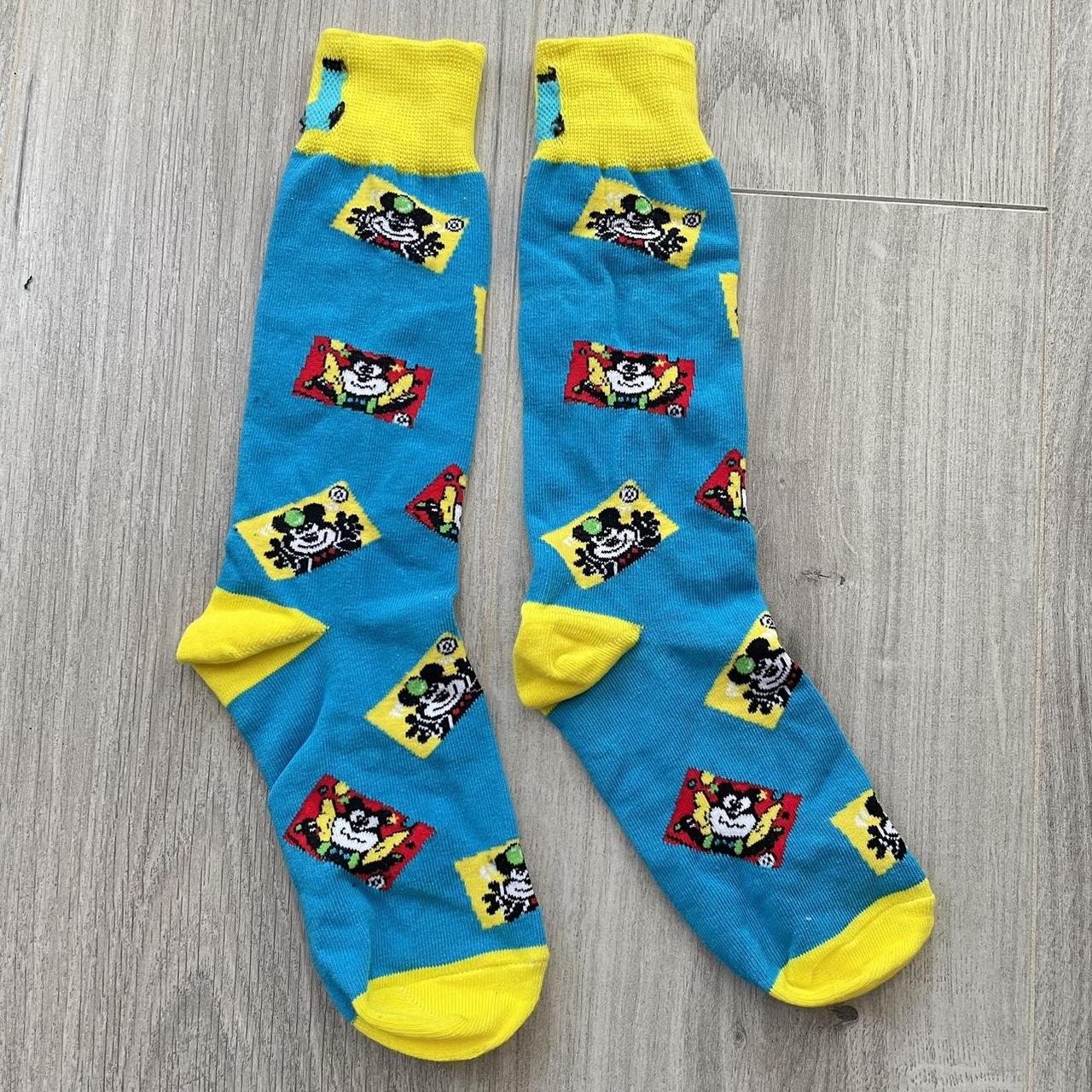 Brand new! Yellow and blue socks with cool graphic.... - Depop