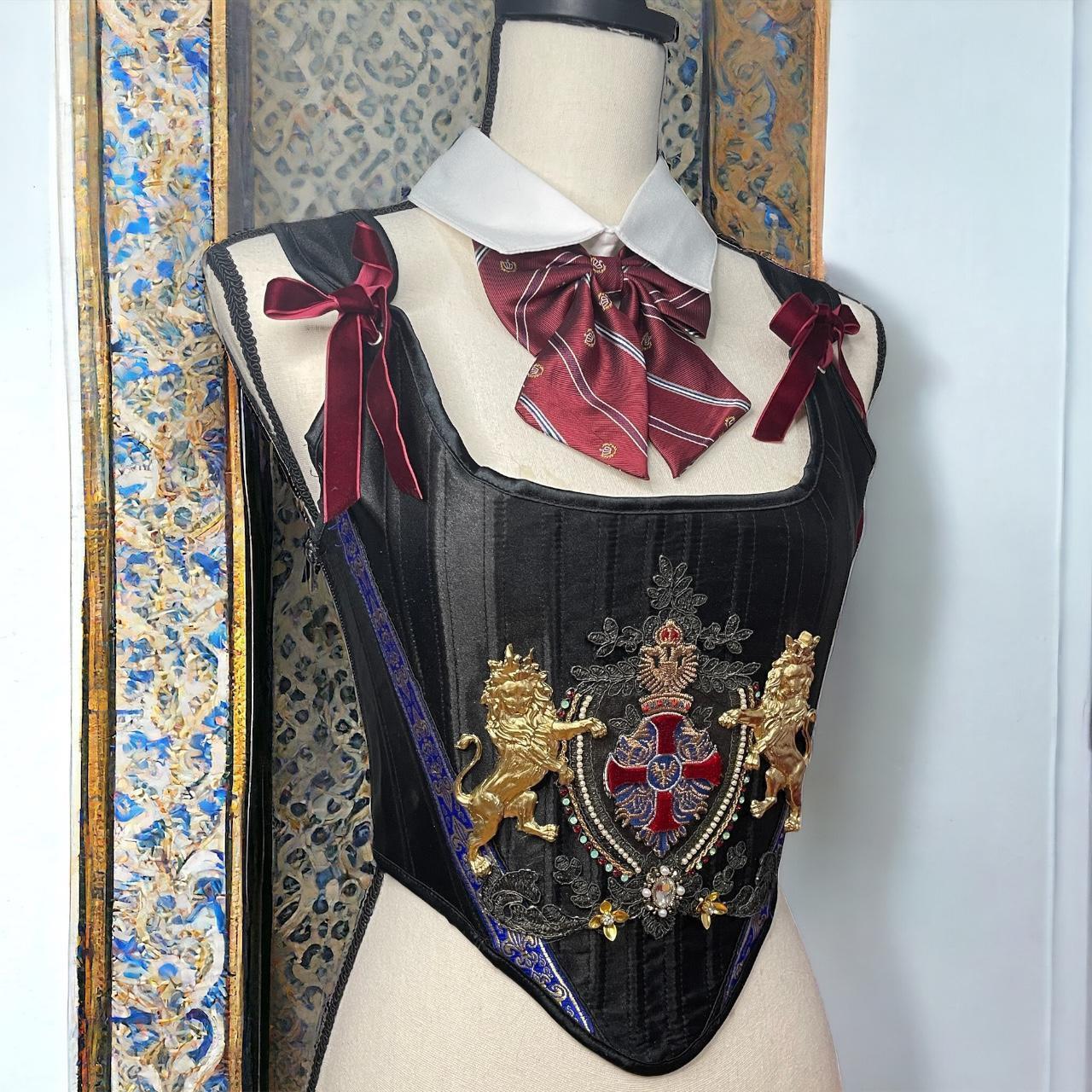 Stunning royal lion crest bustier top. Black bustier... | Depop