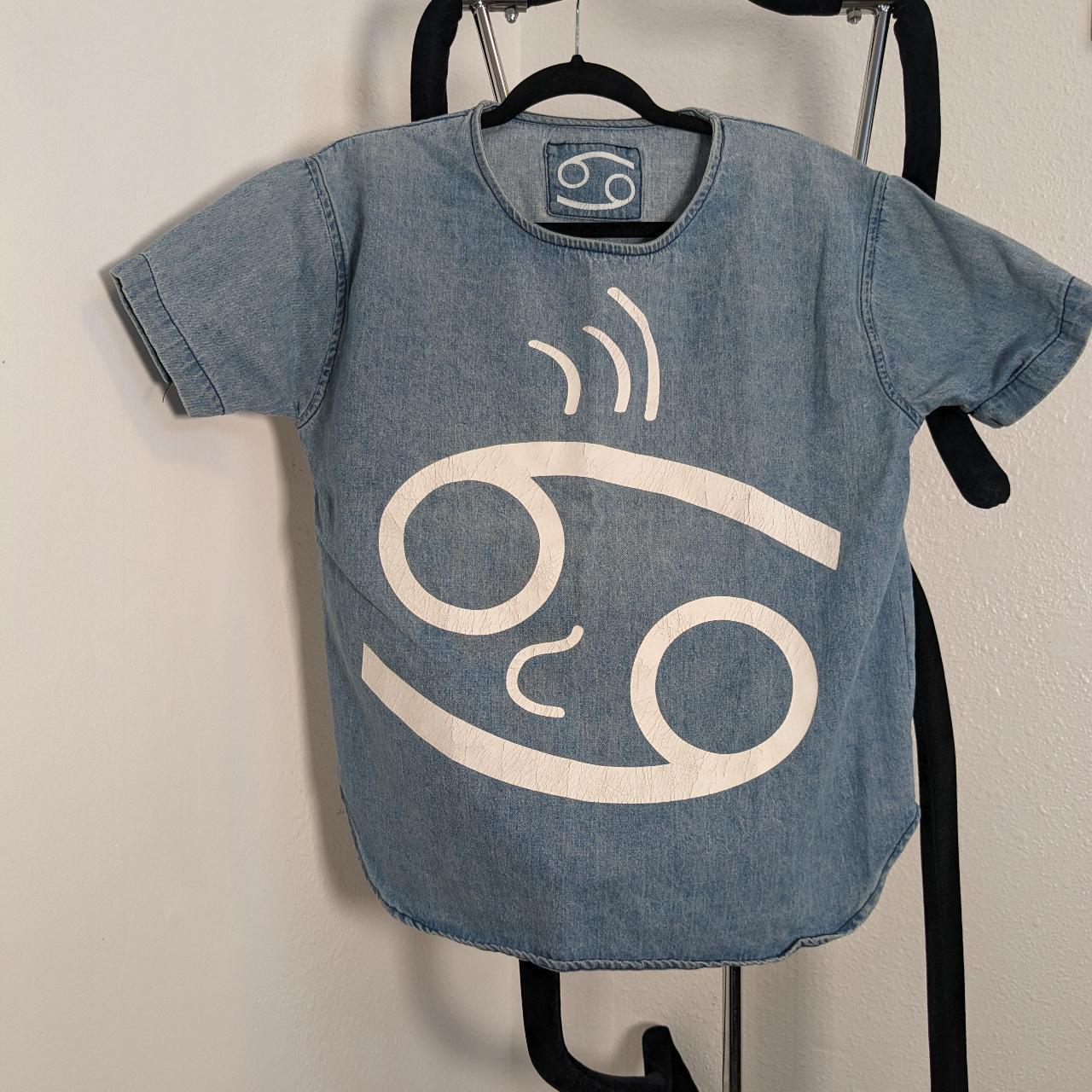 69 US denim tee size XS-S. Some cracking on the... - Depop