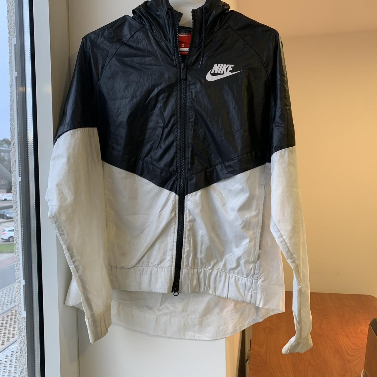 Nike rain jacket/wind breaker, some discoloration at... - Depop